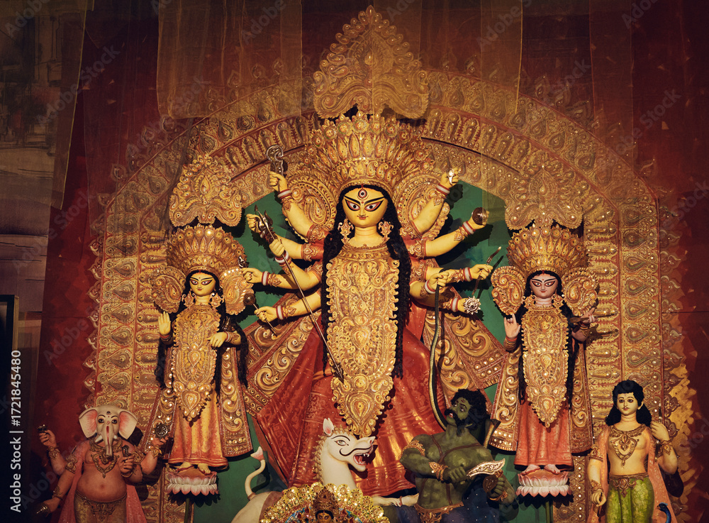 Family of hindu Goddess Durga fighting demon Mahishasura, along with ...