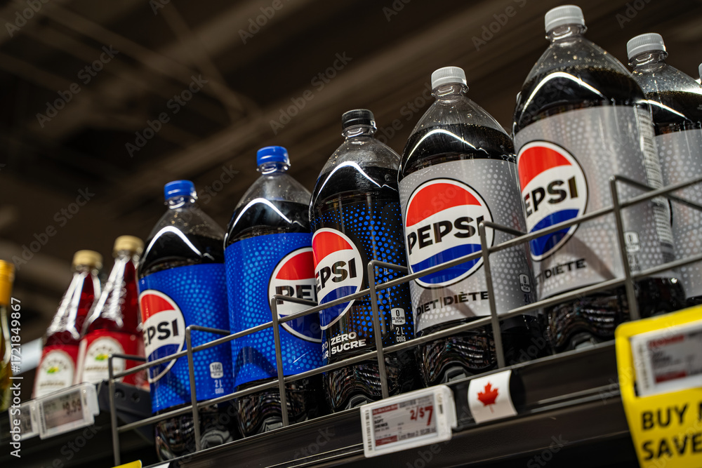 Bottles of Pepsi regular, zero sugar, and diet soda on supermarket ...