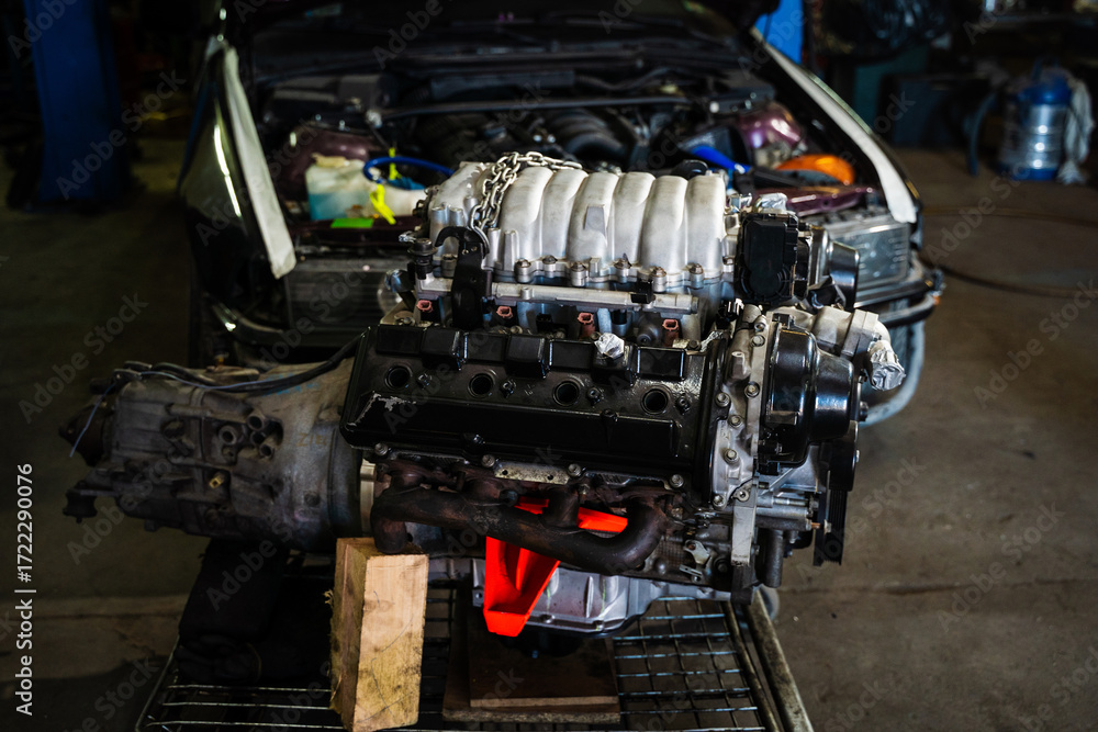 Engine Swap in Progress. Custom V8 engine prepared for installation in ...