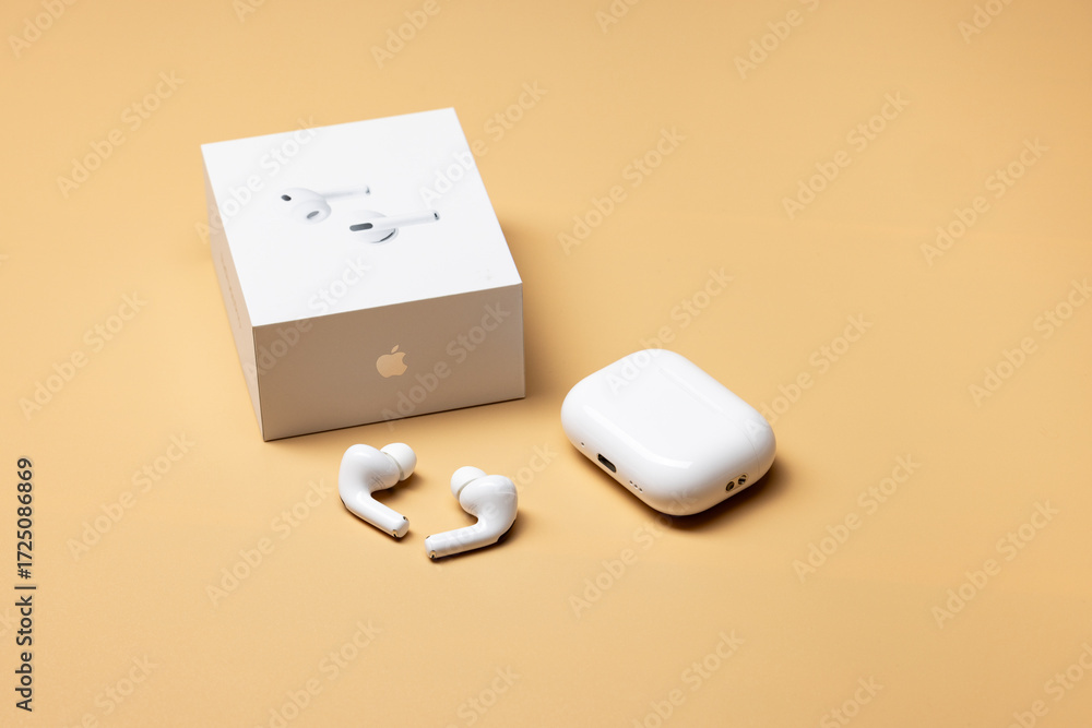 Apple AirPods Pro 3 next to packaging box on beige background on ...