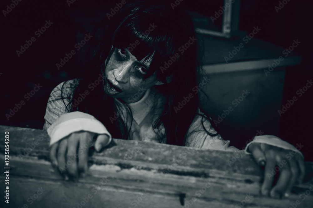 Creepy horror woman with long hair and white dress standing in dark ...