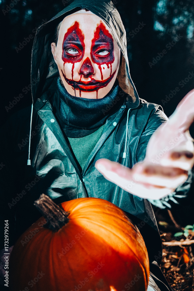 Foto stock di Halloween holiday. Creepy Person in Costume Holding ...