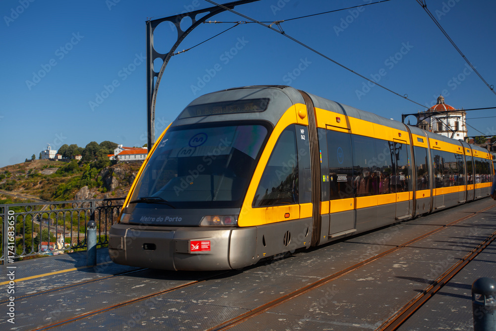 Porto, Portugal - July 24, 2025: Porto Metro train runs along the Ponto ...