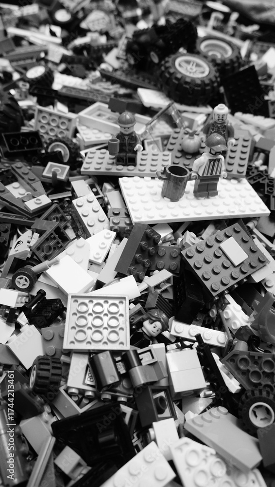 Black and white photograph of a pile of scattered Lego bricks and ...