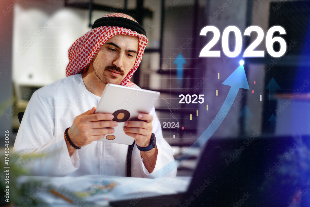 Man in traditional attire reviews data trends for the years 2024 to ...