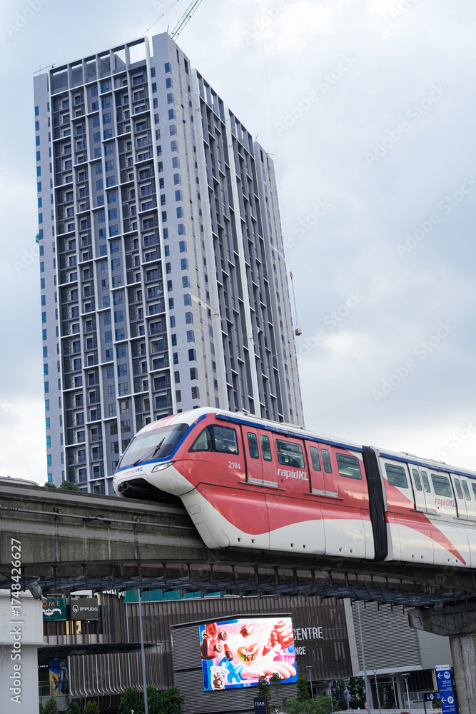 16 September 2025 A sleek skyscraper rises beside an elevated rail line ...