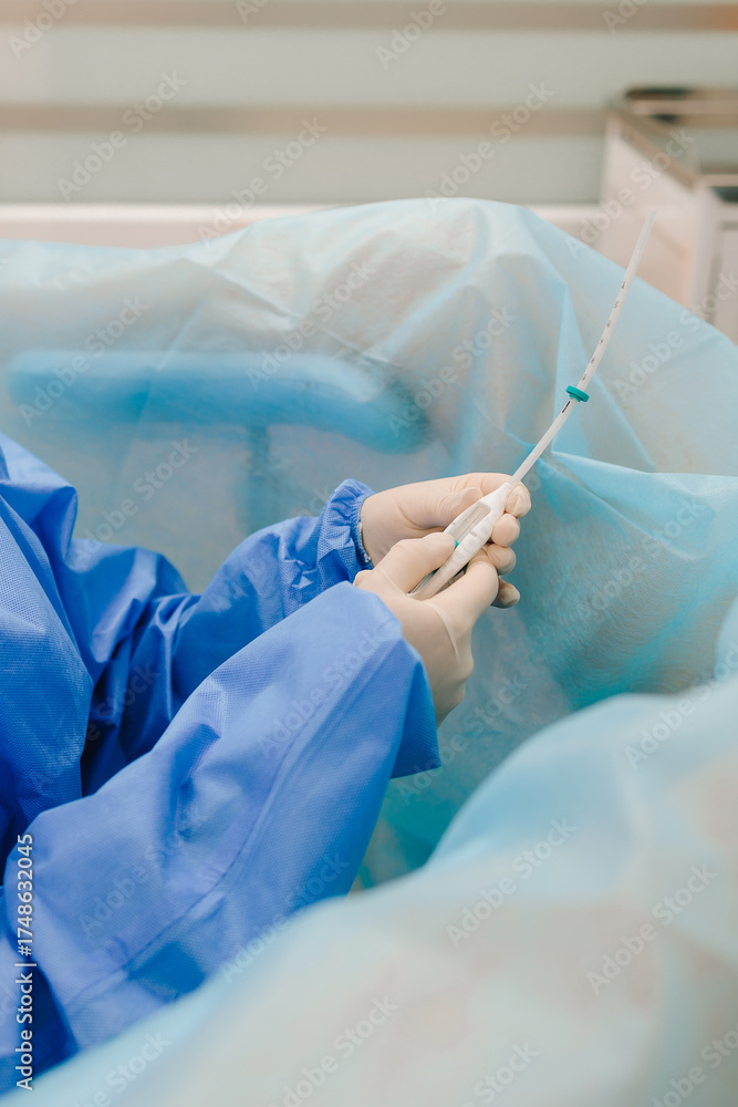 Stock-Foto „Gynecologist performing IUD insertion. Intrauterine device ...