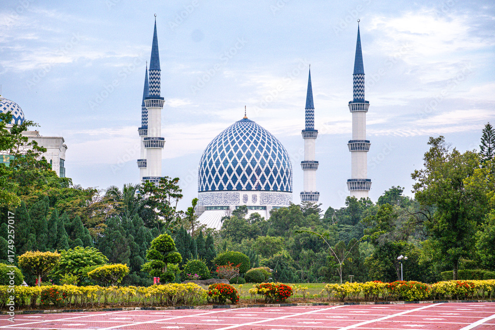 Landscape view of Sultan Salahuddin Abdul Aziz Mosque with lush ...