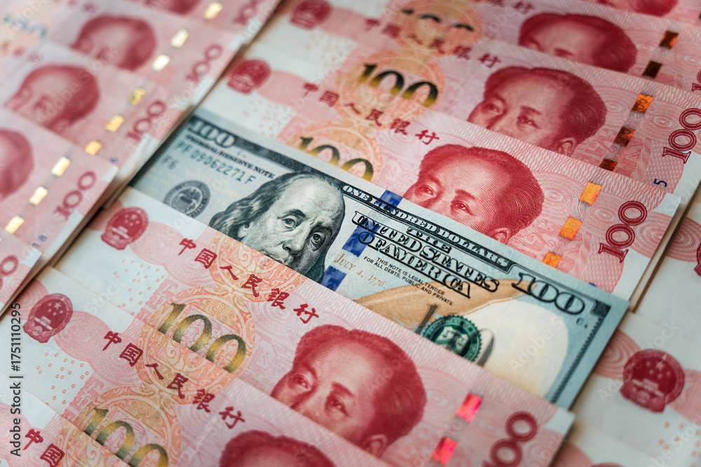 America dollar and Yuan banknote with USA and China flags. Its is ...