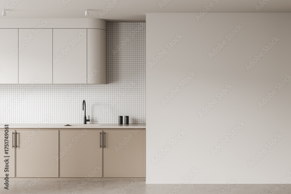 Modern kitchen interior with blank wall space and minimalist cabinetry ...