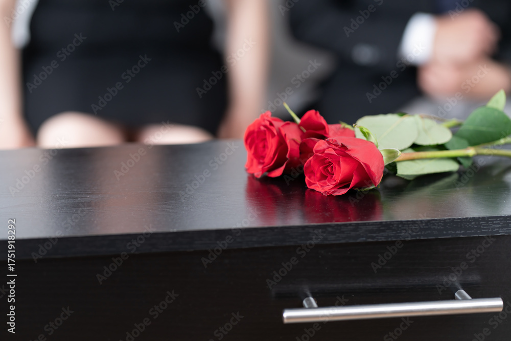 Stock-Foto „Rose, coffin and funeral at cemetery indoor at burial ...