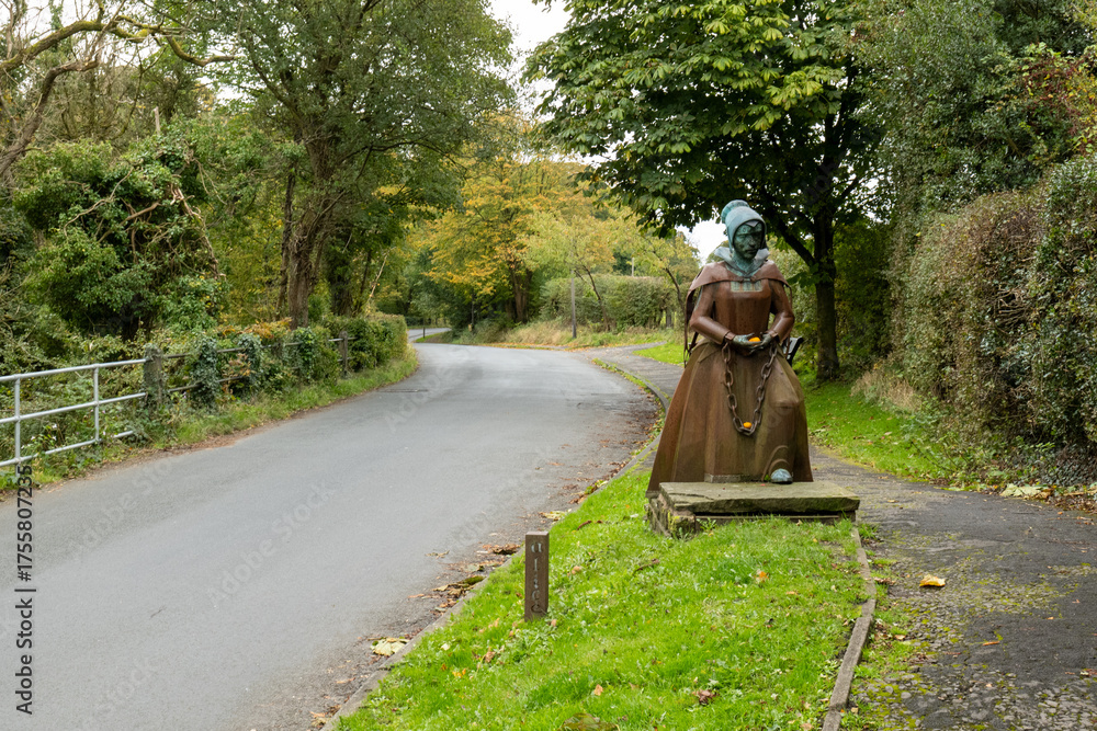 Roughlee, Lancashire, Oct 7 2025 – Weathered metal statue of Alice ...