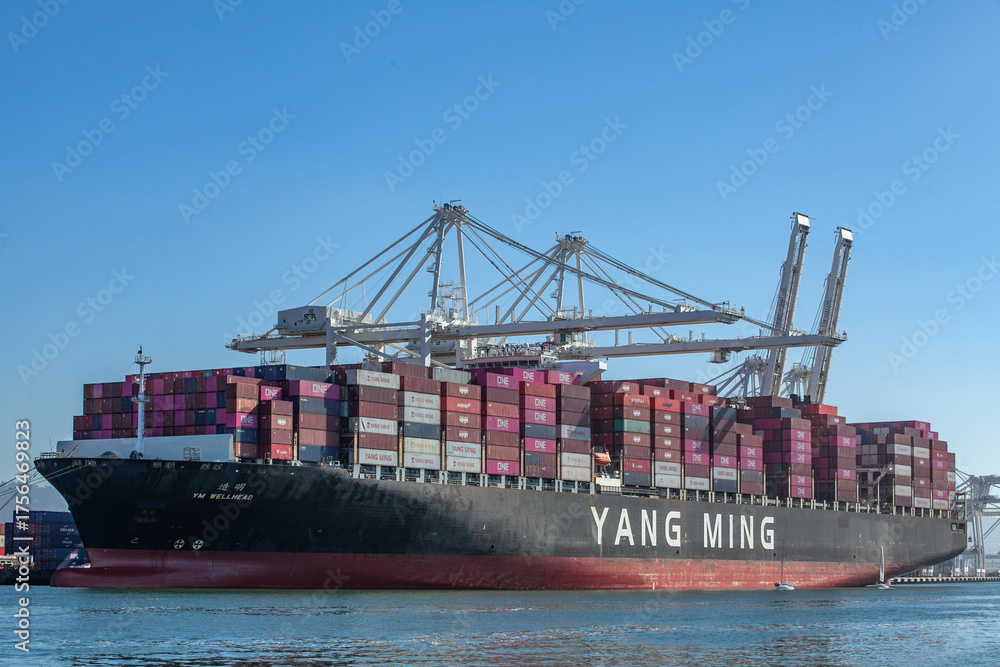 Yang Ming cargo ship at Port of Oakland with stacked containers labeled ...