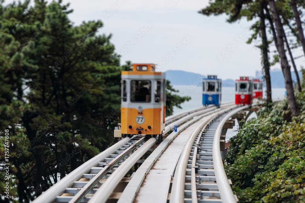 Haeundae Blue Line Park, Busan, ride on multicoloured sky capsule train ...