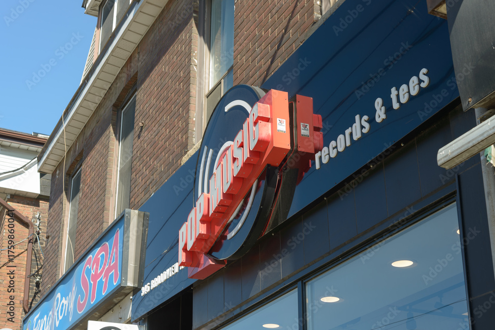 angle view, facade and sign of Pop Music, a record store, located at ...