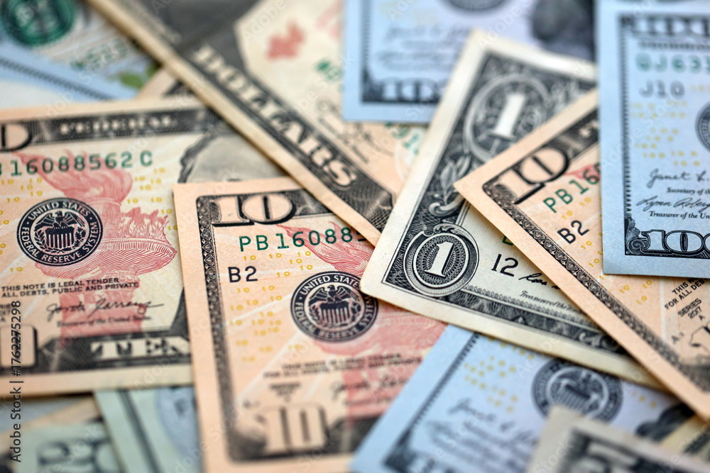 Big amount of different dollar bills close up. Hundred fifty twenty ten ...