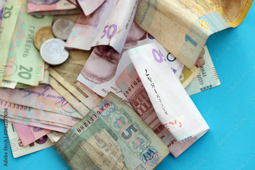 Big amount of different Ukrainian hryvnia money bills. Pile of crumpled ...