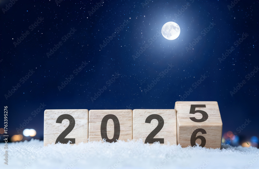 Wooden Blocks Showing 2025 Changing to 2026 on Snow Under a Full Moon ...