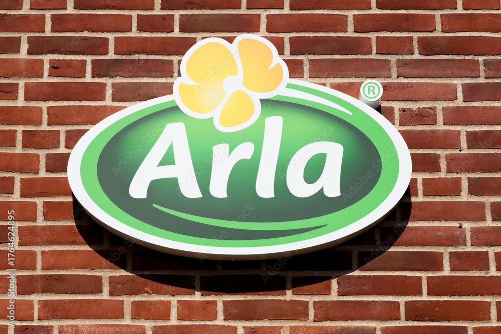 Foto Aarhus, Denmark - August 22, 2015: Arla Foods logo on a brick wall ...