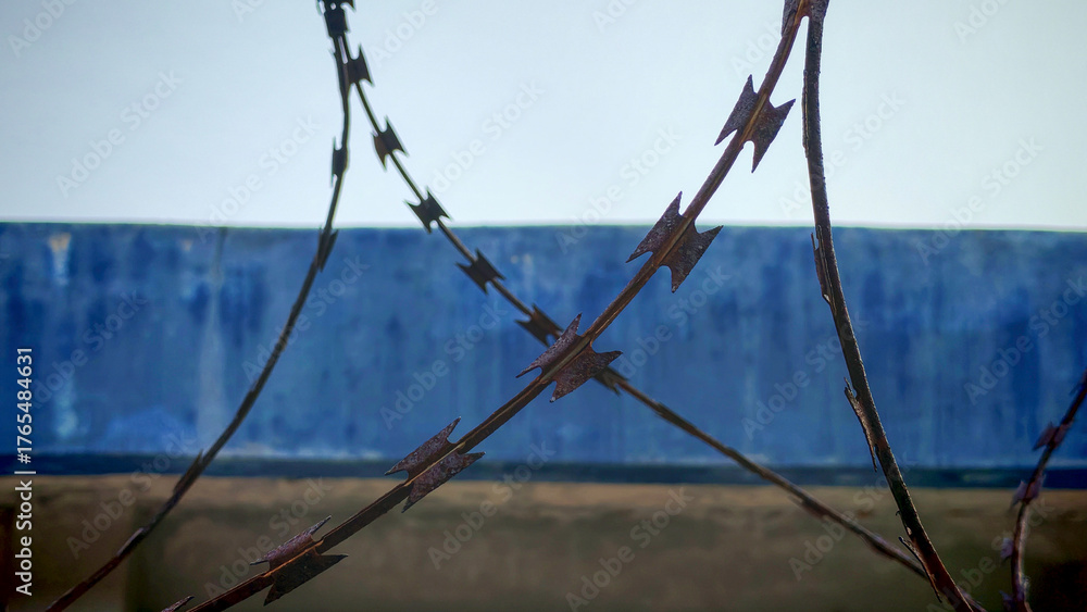 Rusted Razor Wire Close-Up: Symbol of Restriction, Security, and Danger ...