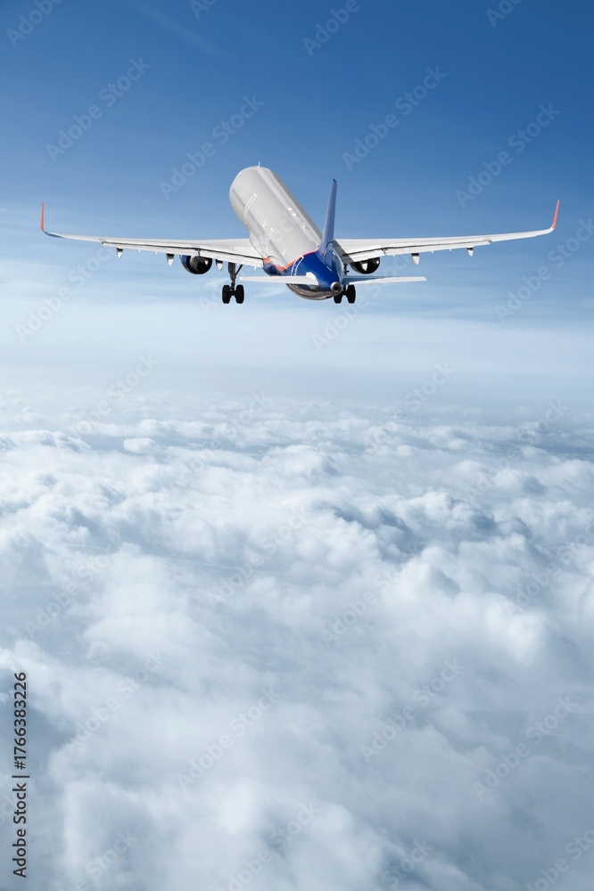Bright passenger airplane plane flying in sky Stock Photo | Adobe Stock