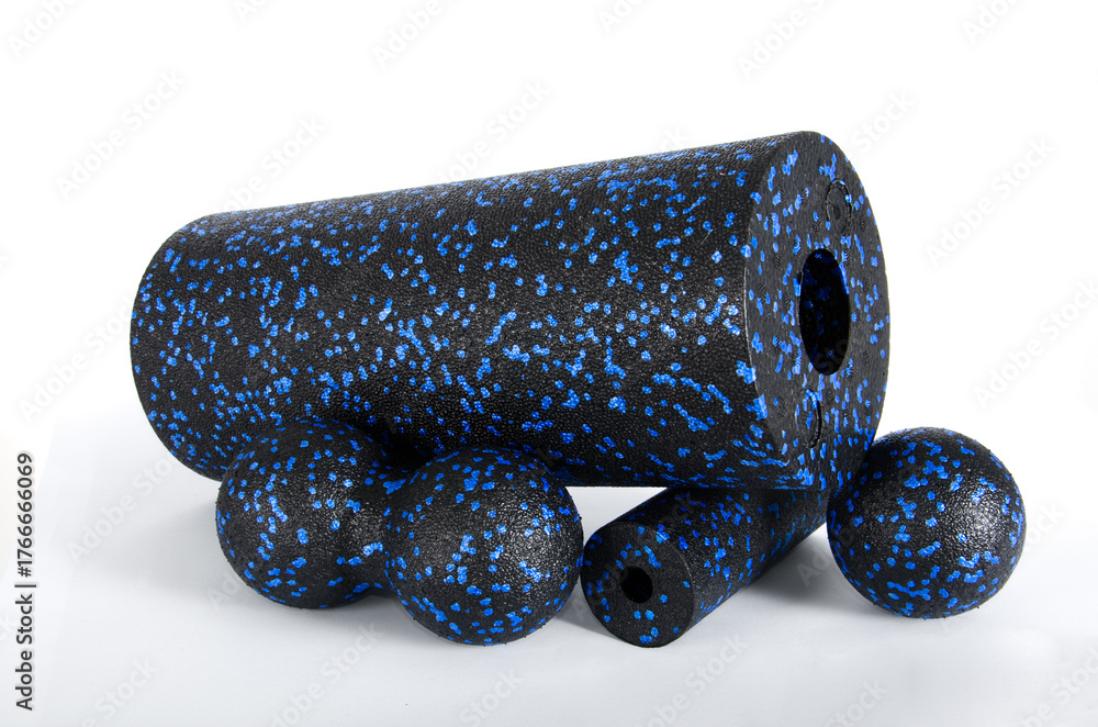 Massage set: A blue ball and mfr massage roller isolated on a white ...