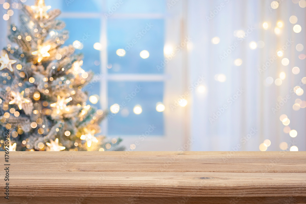 Wooden table top for product display in front of blur Christmas tree ...