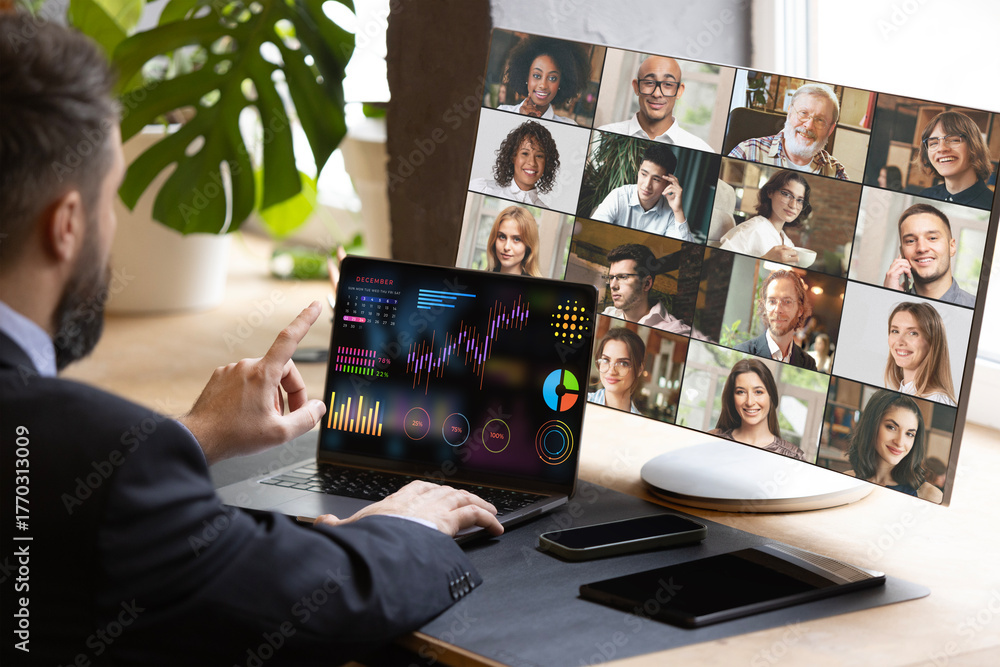 Businessman in virtual meeting presenting financial data charts with ...