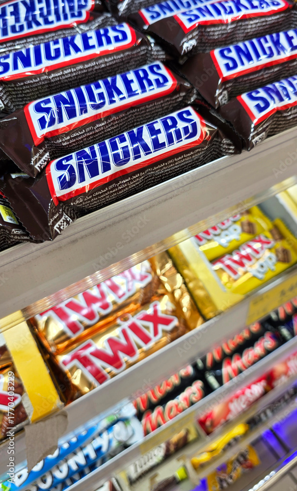 Dubai, United Arab Emirates - October 19, 2025: Snickers chocolate bars ...