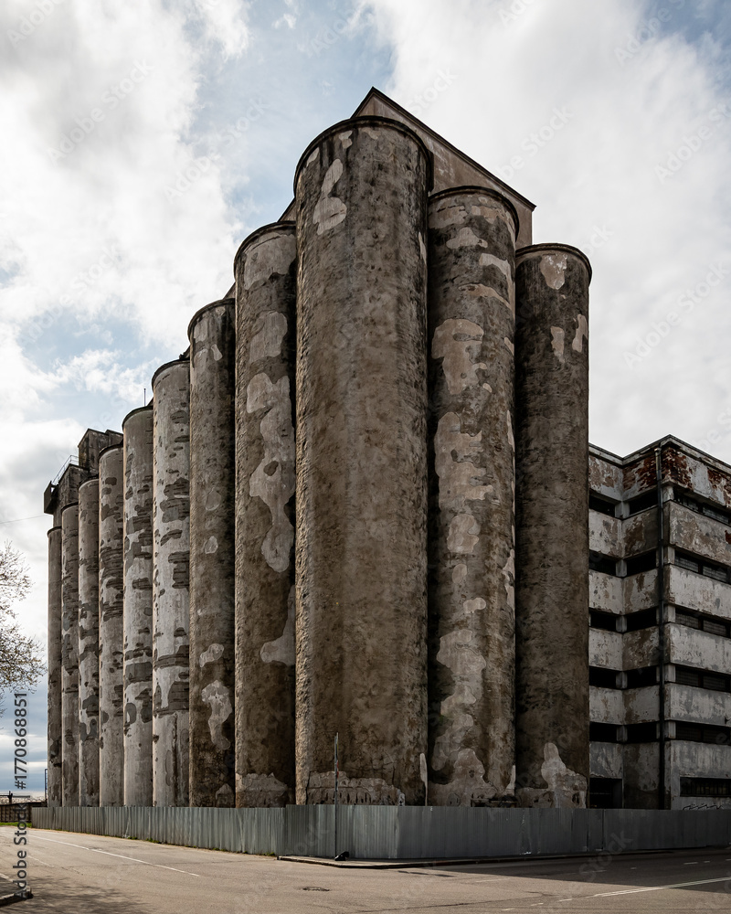 A monumental view of the elevator towers of the abandoned Vyborg grain ...