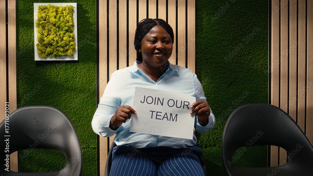 African american businesswoman from the hiring team displaying ...