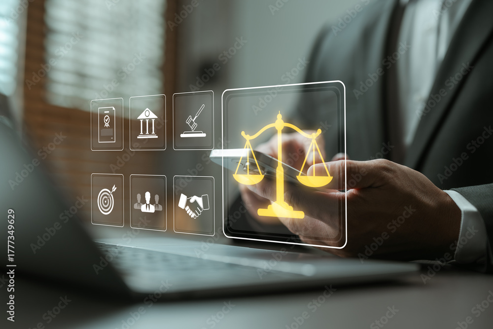 Businessman using digital legal technology interface with justice scale ...