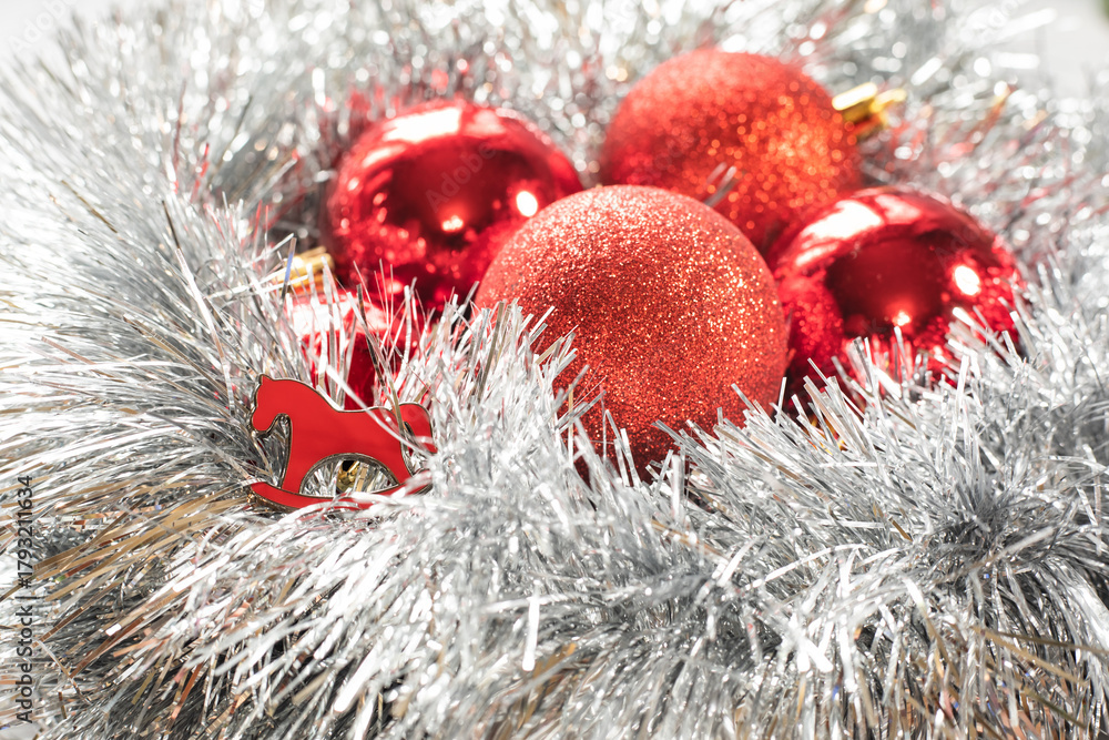 Red Christmas balls and a red horse icon are a symbol of the New Year ...