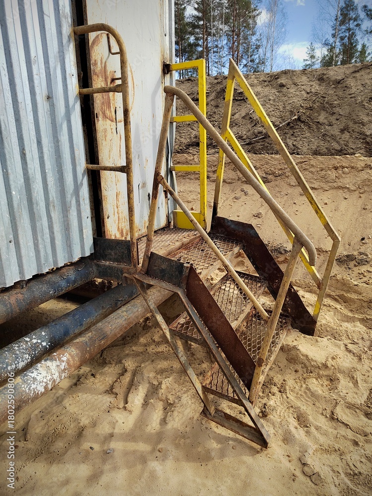 Stock-Foto „Rusty Metal Stairs to Old Industrial Cabin. Dangerously ...