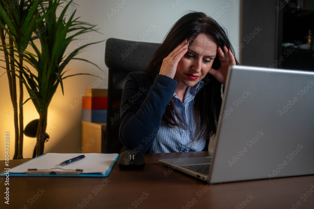 Business woman having headache at office Stock Photo | Adobe Stock