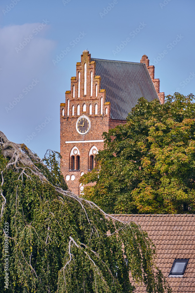 Tall Brick Gothic tower in Ahus featuring steep stepped gables and a ...