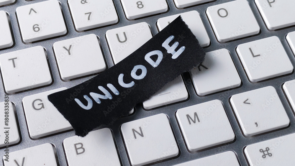 Unicode Encoding Standard Concept with Black Paper Note on Computer ...