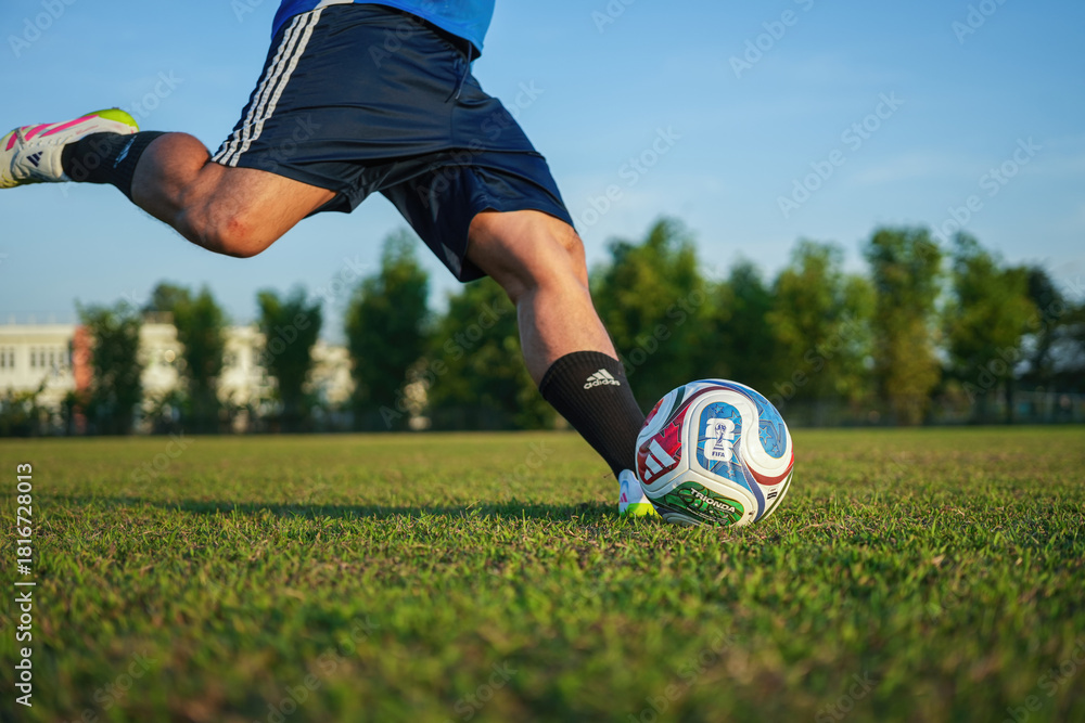 Bangkok, Thailand - 23 November 2025; A football player is training ...
