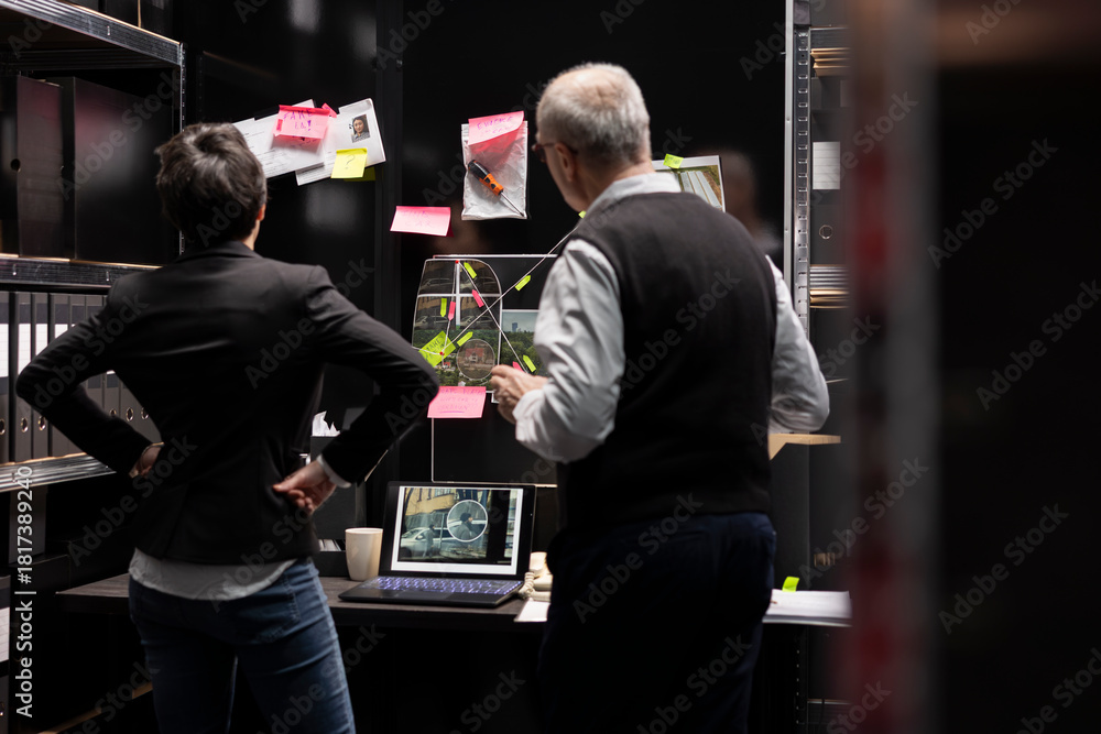 Team of two private detectives investigating an organized crime case ...