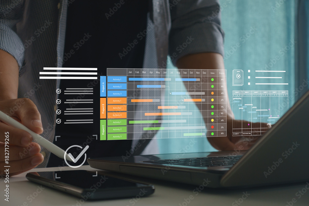 Stock-Foto „professional managing project timelines with digital Gantt ...
