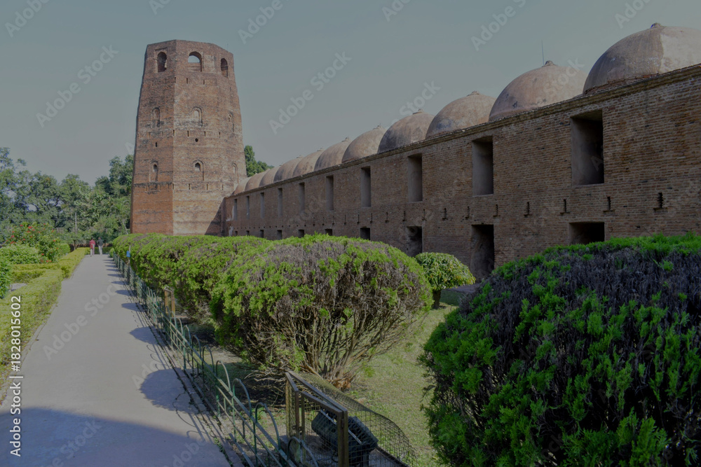 historic brick mosque of 'katra masjid' with domes and minarets ...