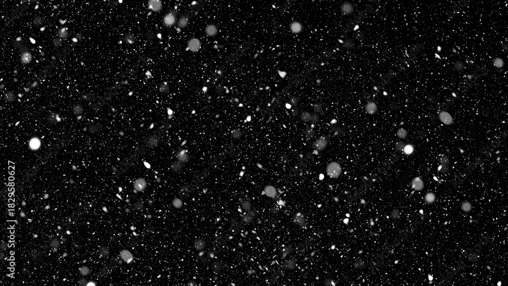 Heavy snowfall effect with large, blurred, white snowflakes and smaller ...