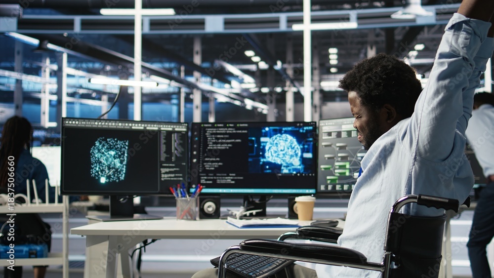 Stock-Foto „Engineer using wheelchair in data center using AI node tree ...