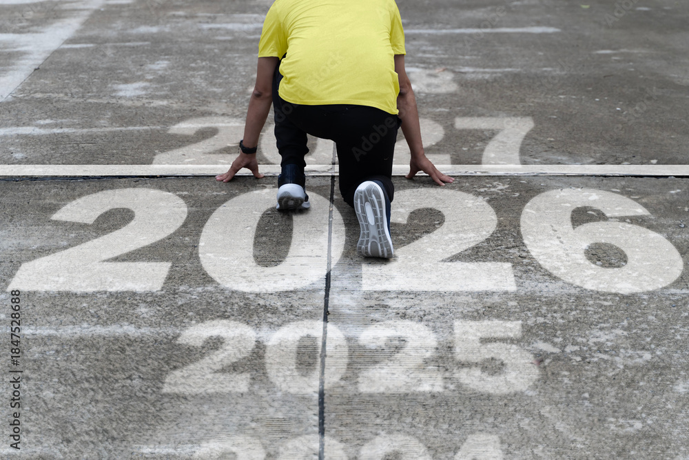 Runner at start line with overlapping year numbers symbolizing progress ...