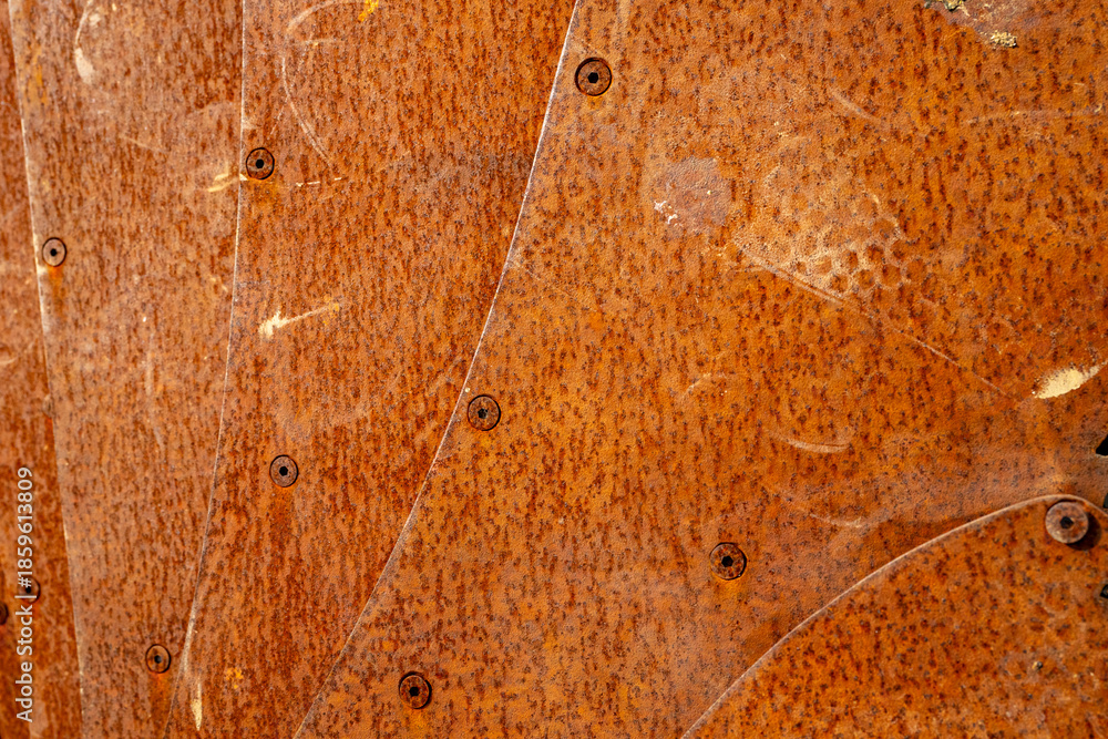Old steel sheet and rusty surface. To remove the rust, use a wire brush ...
