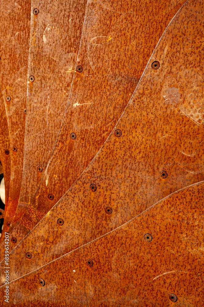 Old steel sheet and rusty surface. To remove the rust, use a wire brush ...