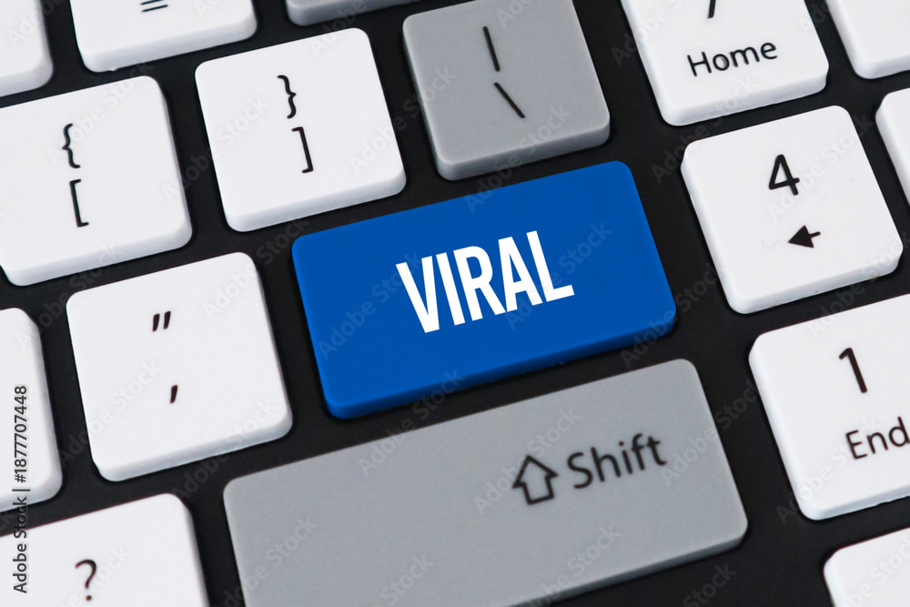 Foto de Stock Viral button on computer keyboard. Concept of social ...