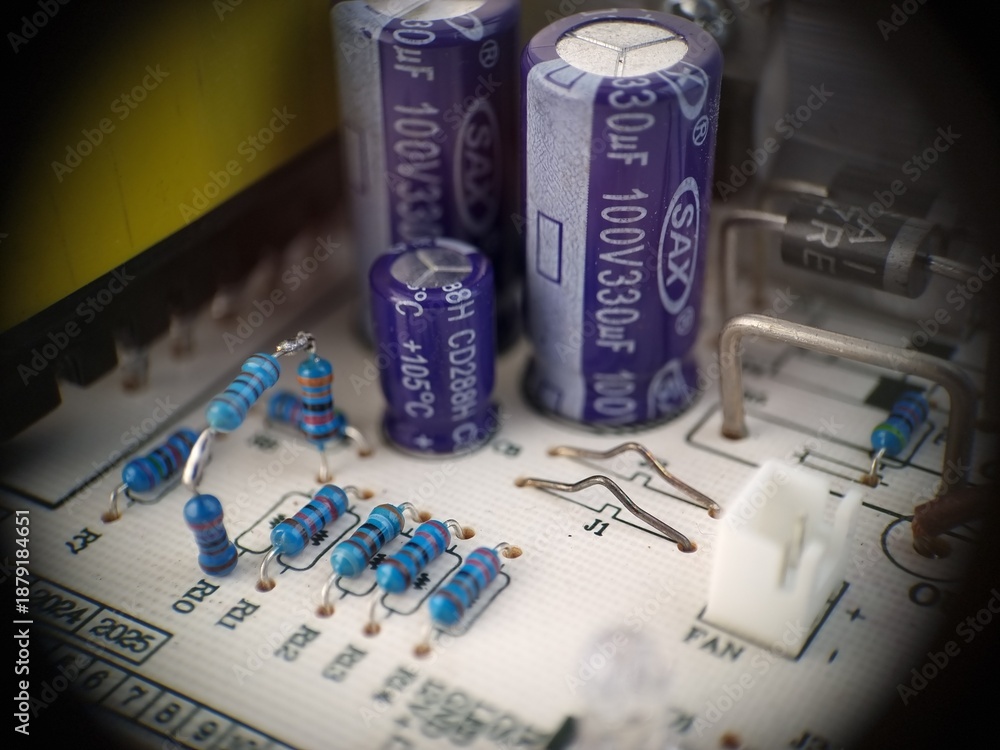 Electronic components on circuit board with capacitors and resistors ...