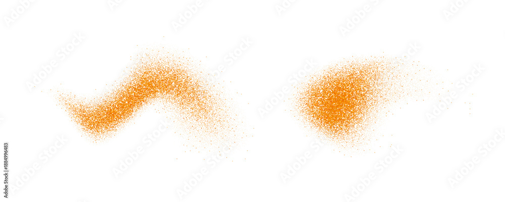 Orange spices powder splashes. Cumin and curry flakes scattered on ...