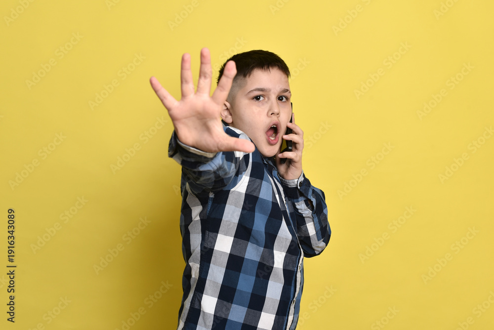 Stock-Foto „Young boy victim of phone harassment, showing the concept ...